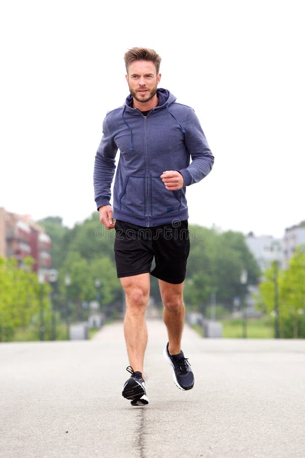 Middle Age Active Male Sitting and Listening To Music Stock Photo ...