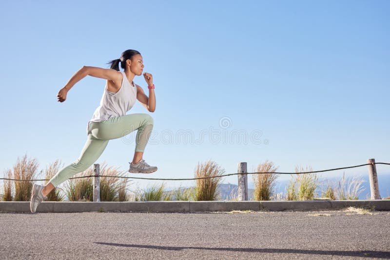 Active Mixed Race Young Woman Running for Exercise Outdoors. Athlete ...