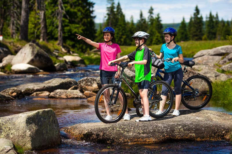 Family biking stock image. Image of group, bicycles, horizontal - 26704667