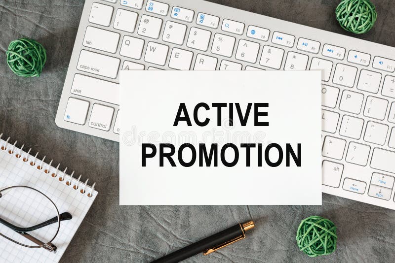 Active Promotion is Written in a Document on the Office Desk Stock ...