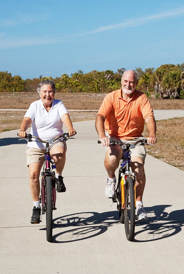 Active Retired Seniors on Bikes Stock Photo - Image of shirt, enjoyment ...