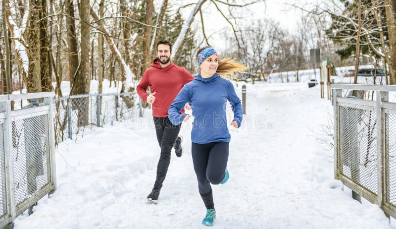 Active Runner Couple Jogging Together in Forest Stock Image - Image of ...