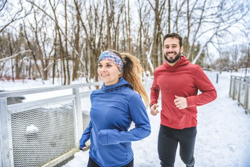 Active Runner Couple Jogging Together in Forest Stock Image - Image of ...