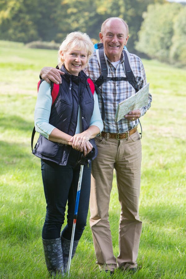 Active Senior Couple on Walk in Countryside Together Stock Image ...