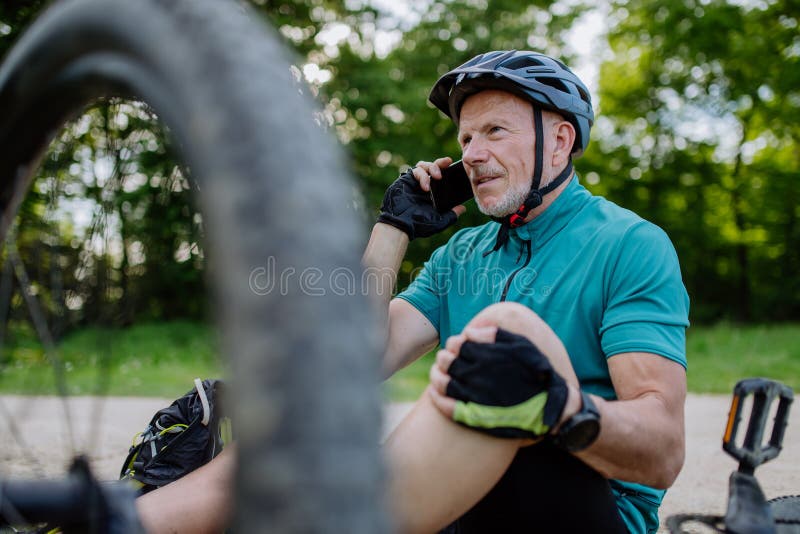 Active Senior Man Calling for Help after His Bicycle Accident. Stock ...