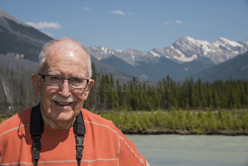 Dapper Senior Man in Blue Hat Stock Image - Image of retired, grey ...