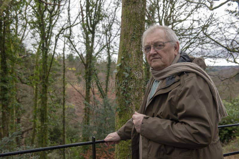 Active Senior Man Waiting for Something in a Woodland Nature Park Stock ...