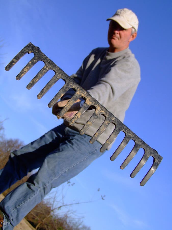 Active Senior Raking stock image. Image of active, jacket - 1466479