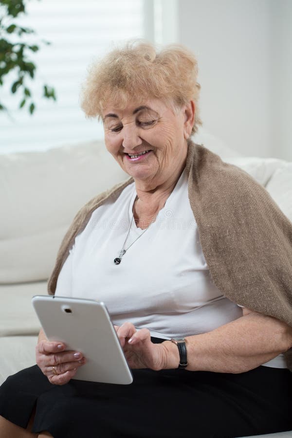 Active Senior Woman Using Tablet Stock Image - Image of retired, home ...