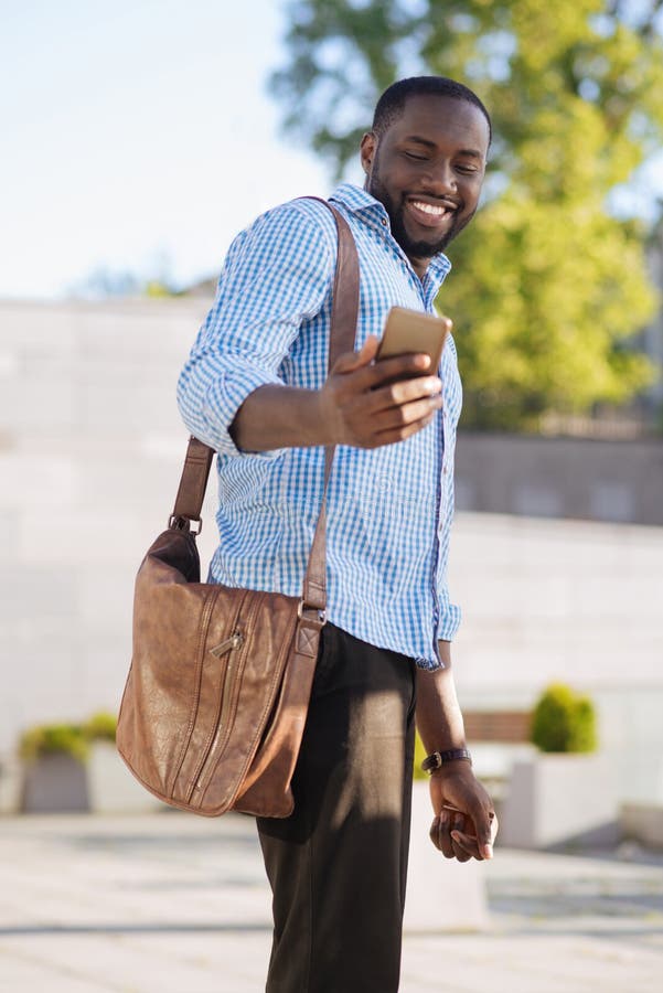 Active Sociable Guy Checking His Phone Stock Image - Image of city ...
