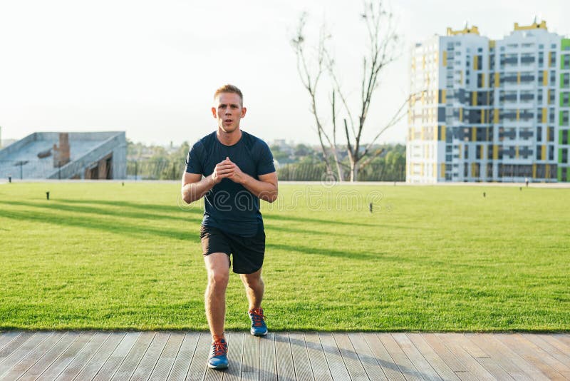 Active Sport Athlete Doing Front Forward One Leg Step Lunge Exercise on ...