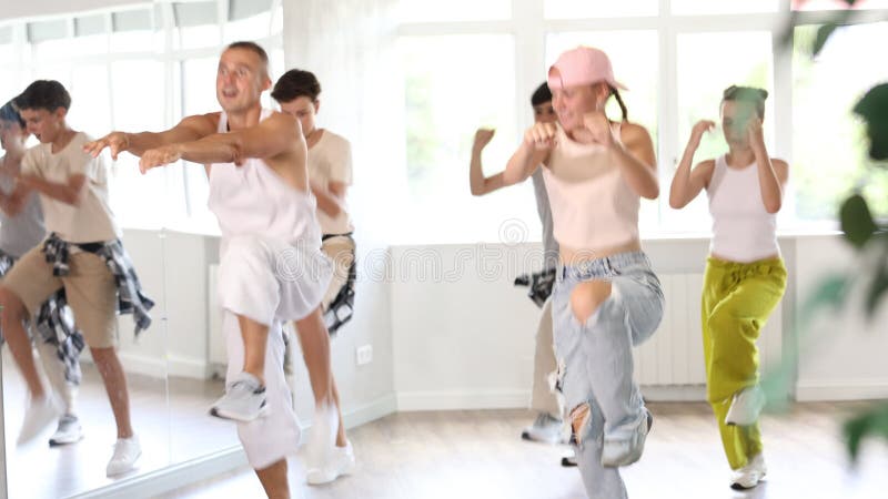 Active Teenagers Practicing Hip-hop Dance in Training Hall during Group Dancing Classes Stock ...