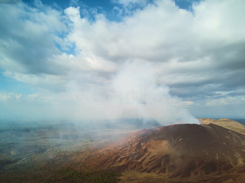 Active volcano with smoke stock photo. Image of beautiful - 115767814
