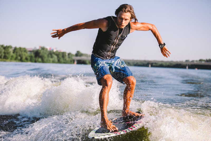 Wake Surfing editorial photo. Image of sports, life, muscles - 32318801