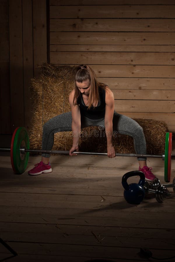 Active Woman Athlete Working Out with Barbell - Powerlifting Stock ...