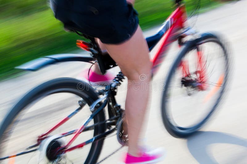 Active woman on a bike stock photo. Image of fitness - 21489134