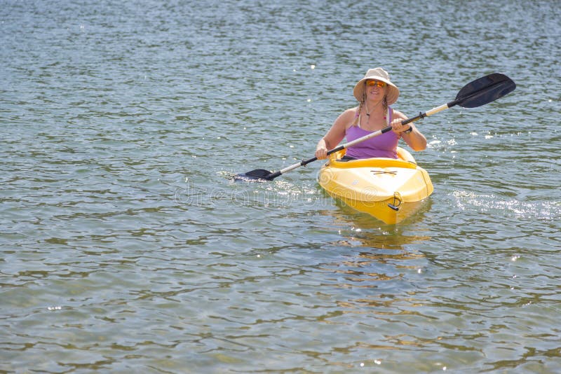 Active Woman Kayaking on Beautiful Mountain Lake. Stock Photo - Image ...