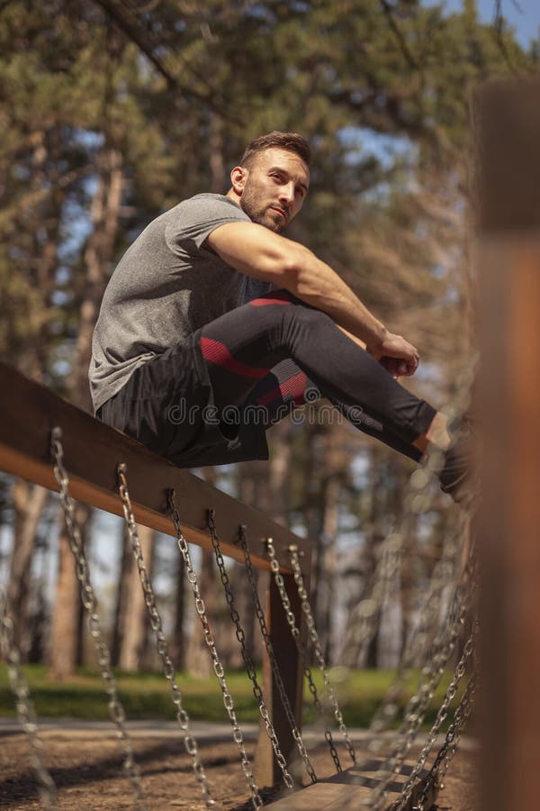 Man taking a workout break stock photo. Image of sunny - 216696400
