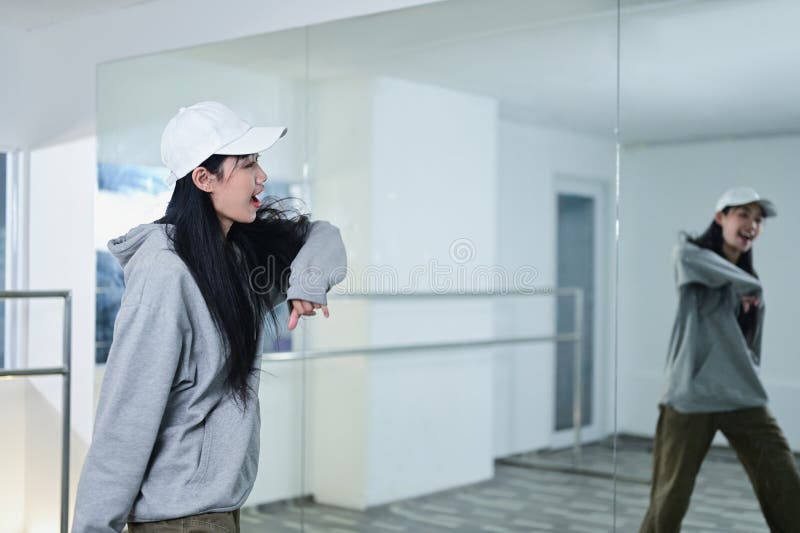 Active Young Woman Enjoy Practicing Break Dance or Freestyle Dance in ...