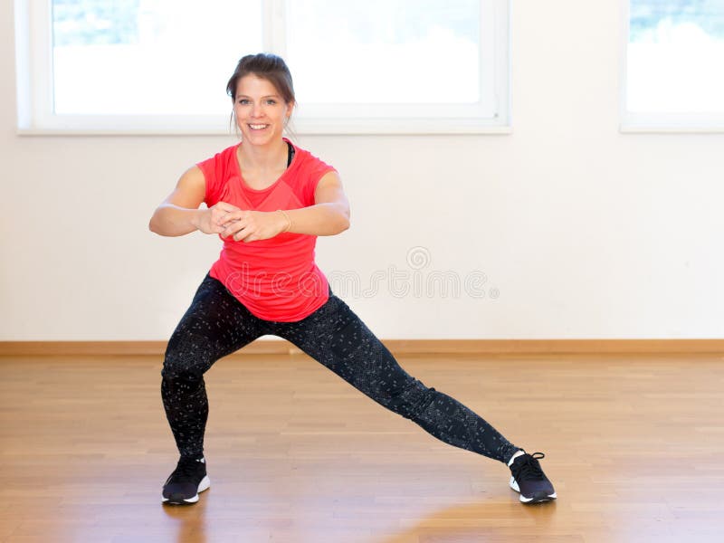 Active Young Woman Exercising Stock Image - Image of active, smiling ...