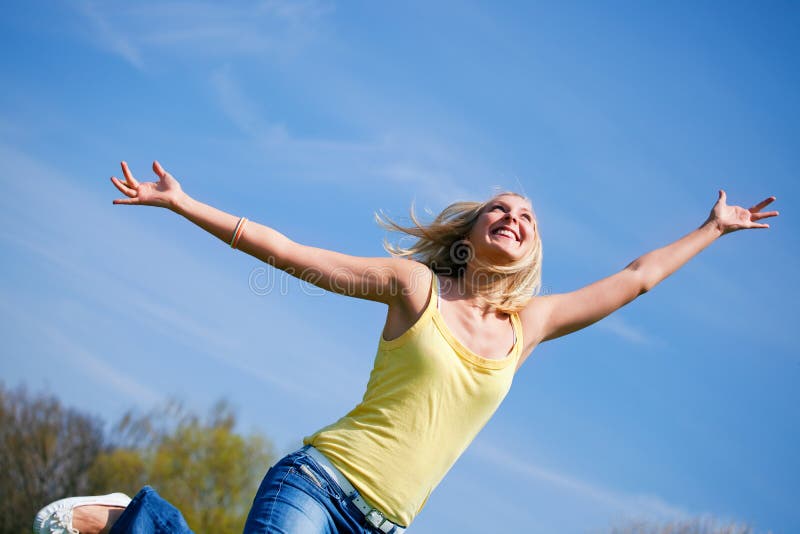 Active Young Woman Jumping High in Sunshine Stock Image - Image of ...