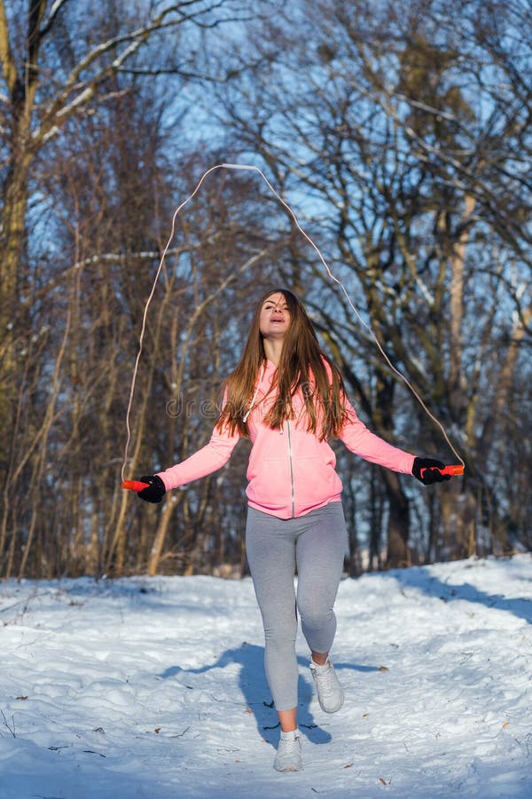 Active Young Woman Performs an Exercise with a Skipping Rope Stock ...