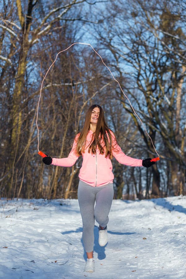 Active Young Woman Performs an Exercise with a Skipping Rope Stock ...