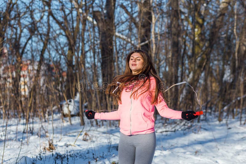 Active Young Woman Performs an Exercise with a Skipping Rope Stock ...