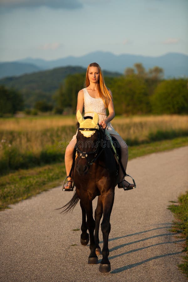 Active Young Woman Ride a Horse in Nature Stock Image - Image of field ...