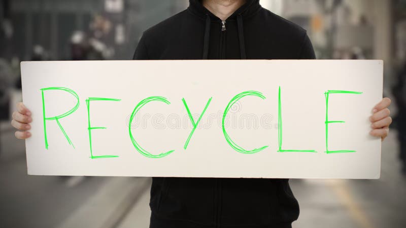 Activist Holds a Placard with Handwritten Text Stock Photo - Image of ...