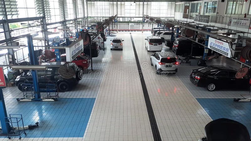 Activity in a Car Workshop Building Stock Video - Video of crowd, view ...