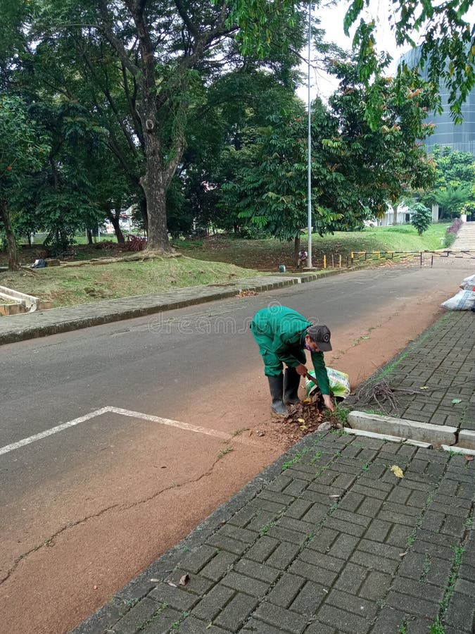 Worker on the Road of Campus Cleaning Trash Stock Image - Image of ...