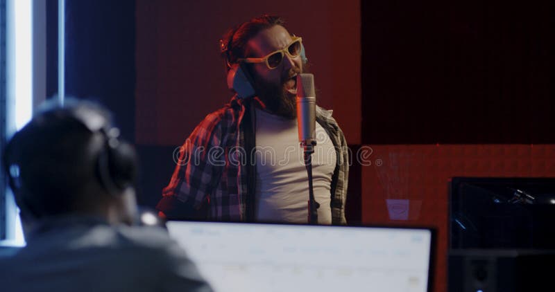 Actor Doing Voice Over in Sound Studio Stock Photo - Image of voice ...