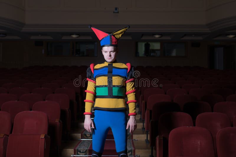Actor Dressed Jester`s Costume in Interior of Old Theater. Stock Image ...