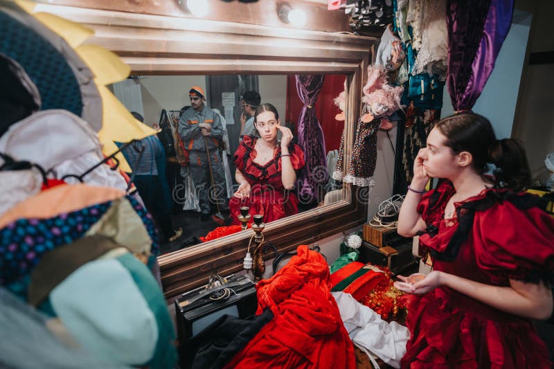 Young Performers Preparing Backstage with Costumes and Applying Makeup ...