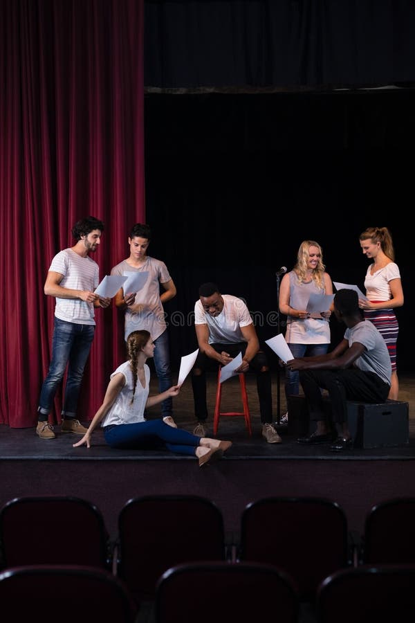 Actors Reading Their Scripts on Stage Stock Photo - Image of acting ...