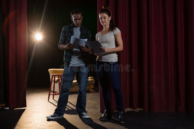 Actors Reading Their Scripts on Stage Stock Photo - Image of casual ...