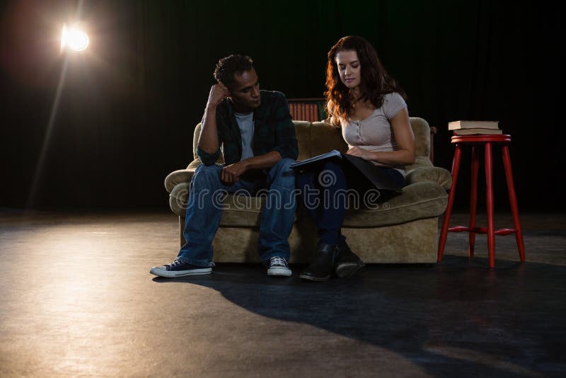 Actors Reading Their Scripts on Stage Stock Photo - Image of actor ...