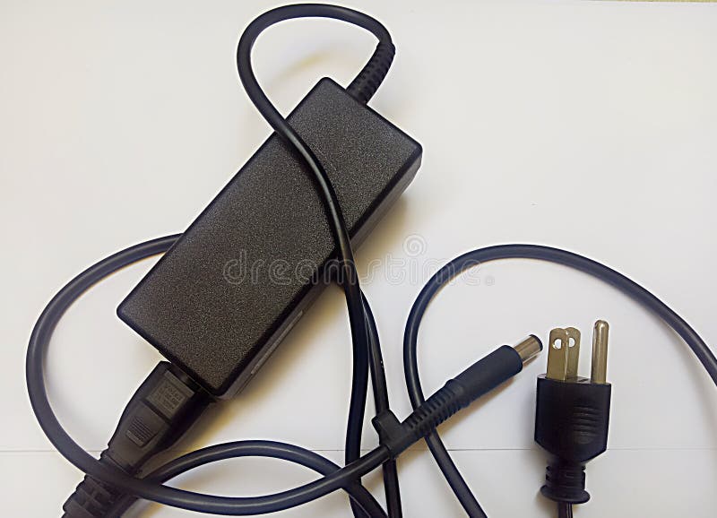 Adapter and Two Black Computer Cable Plugs Stock Photo - Image of black ...