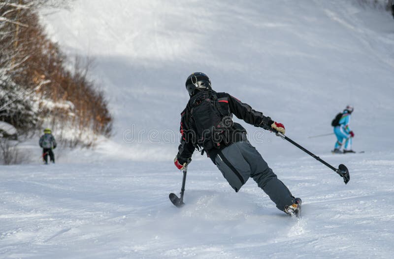 Adaptive Skiing with One Leg : Disabled Ski Racer a Three-tracker Stock ...