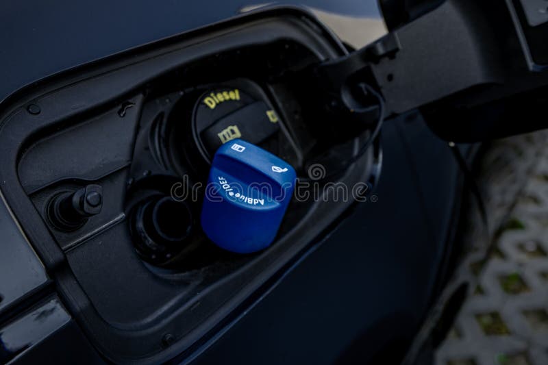 Adblue Fuel Infusion into the Car Stock Image - Image of adblue, grass ...