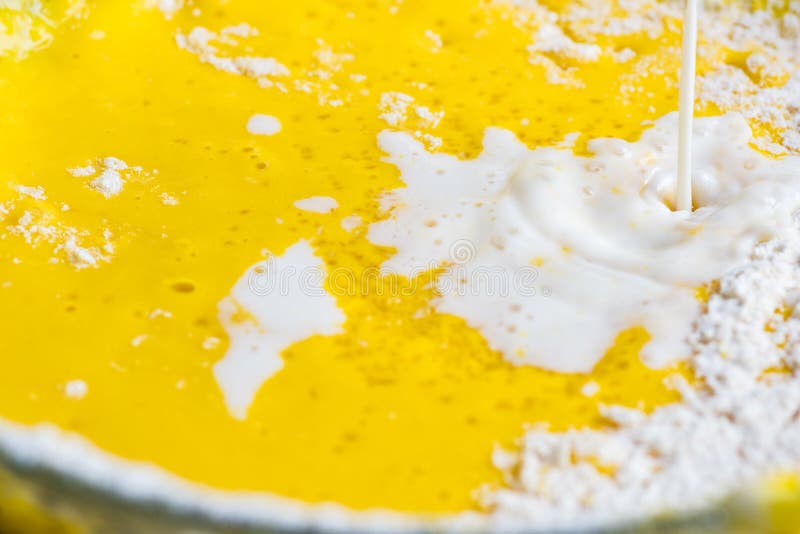 Add Eggs and Flour To a Transparent Bowl for Making Batter. Stock Image ...