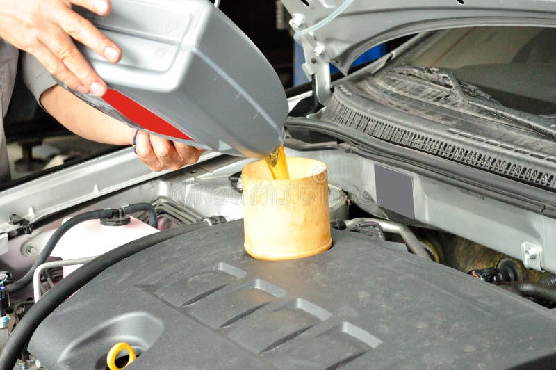 Add engine oil of car stock photo. Image of industry - 34563062