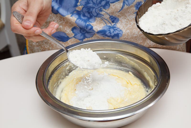 Add flour to the dough stock photo. Image of female - 103842196