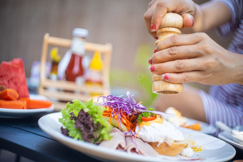 Add Pepper To American Breakfast Stock Image - Image of benedict, sauce ...