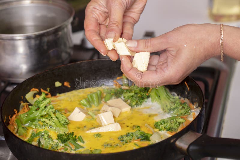 Add Processed Cheese To Puree Soup Stock Photo - Image of person ...