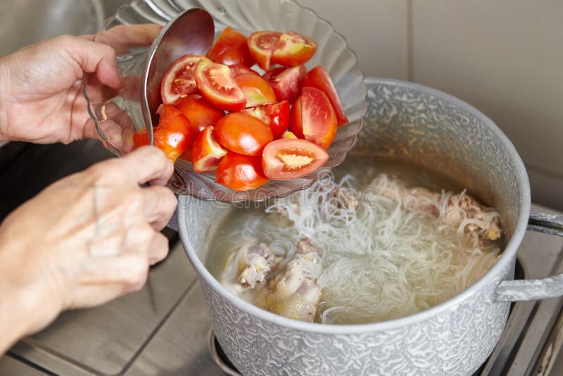 Add tomato stock photo. Image of food, noodle, hand, stew - 53497656