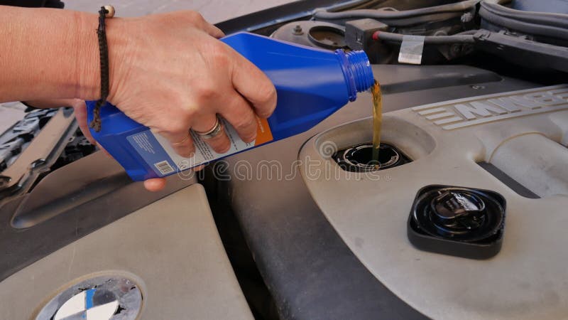 Added Bottled Engine Oil Directly into the Engine Compartment. Mechanic ...