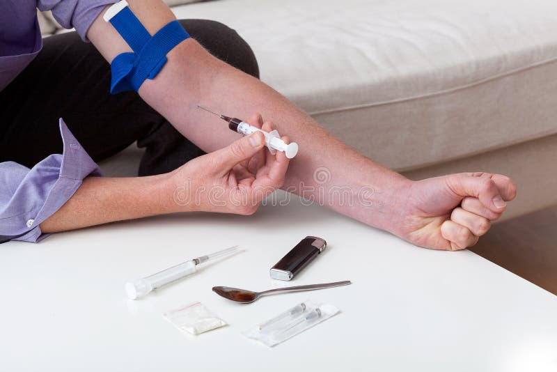 Addict making an injection stock image. Image of filling - 37687475