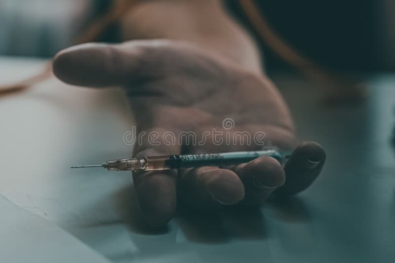 Addict at the Table with a Syringe Heroin Methamphetamine Addiction ...